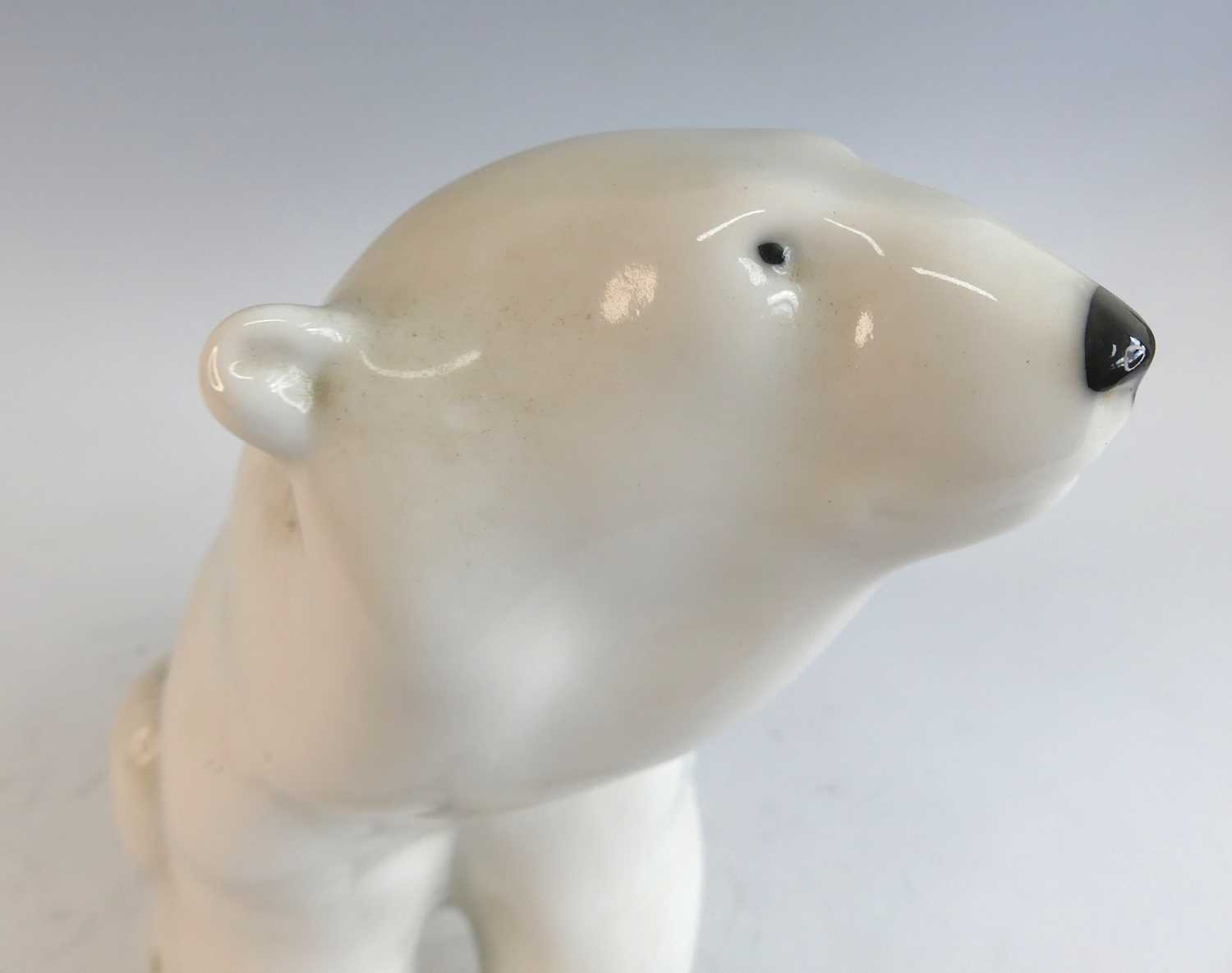 A mid-20th century Russian glazed ceramic model of a polar bear ...